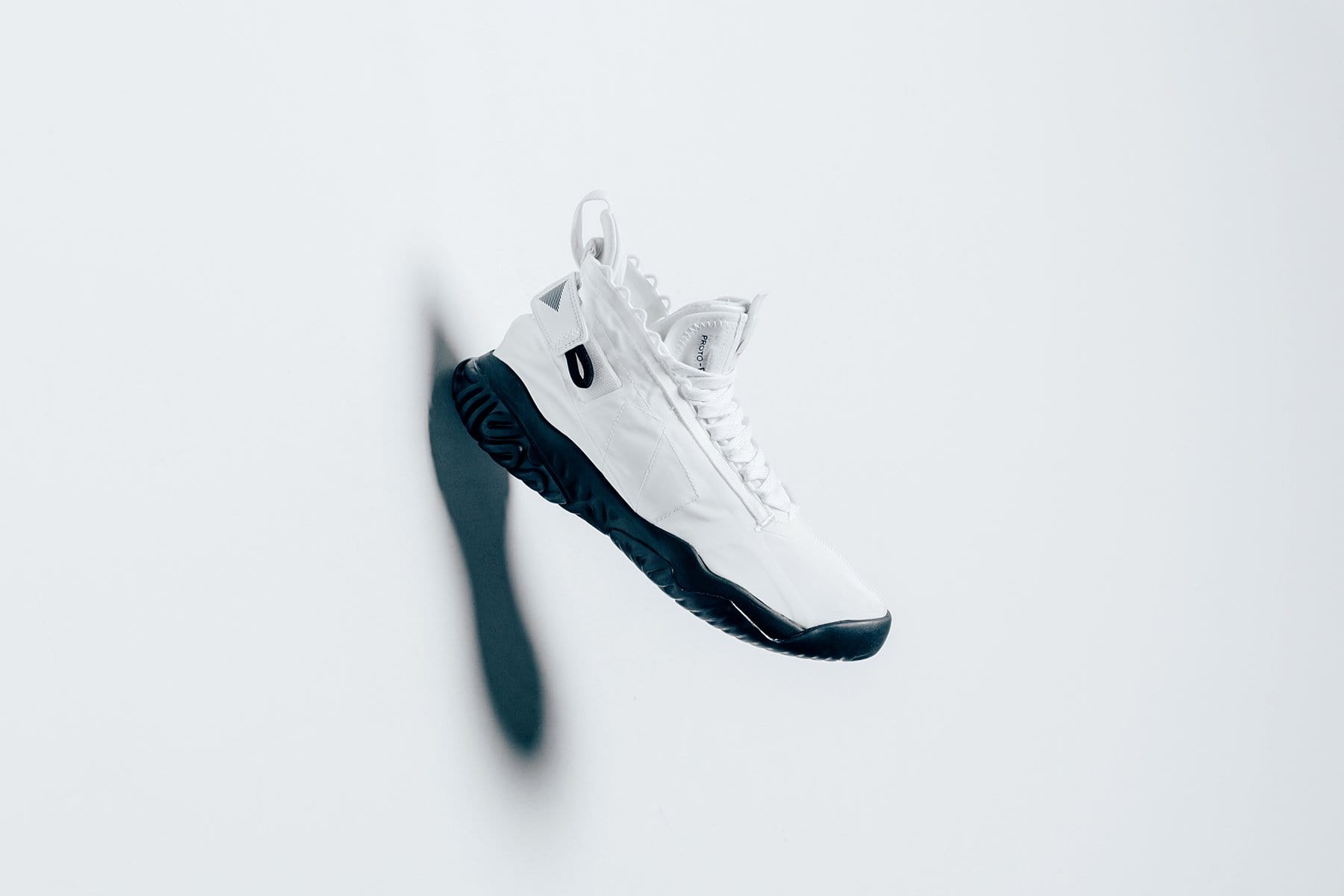 Jordan Proto-React "White/White/Black" Available Now – Feature