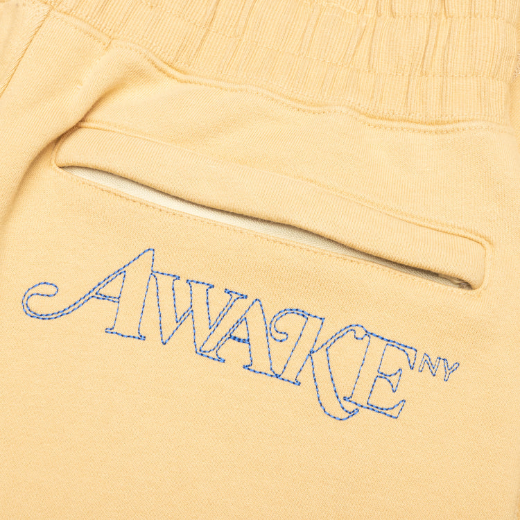 Awake Classic Outline Logo Paneled Embroidered Sweatpants - Mustard ...