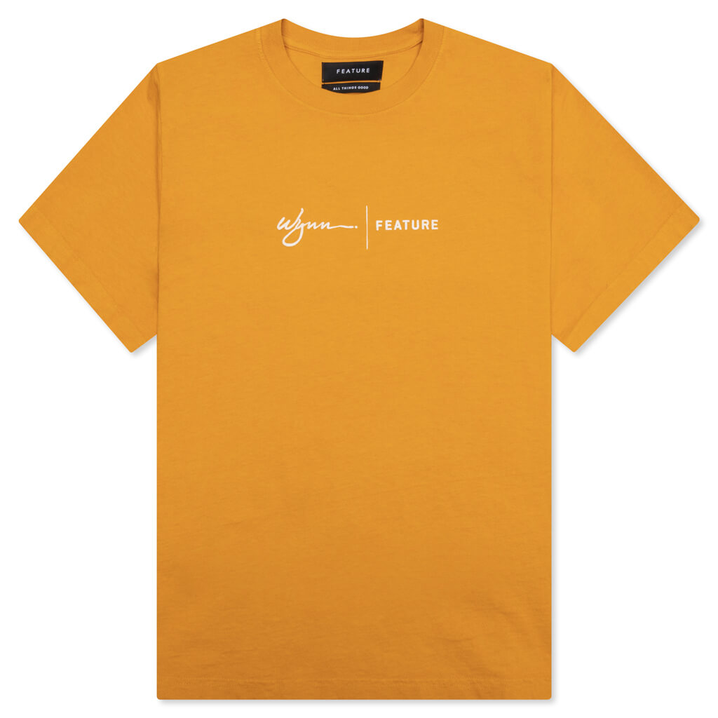 Wynn Logo Lock Up Tee - Golden Yellow – Feature