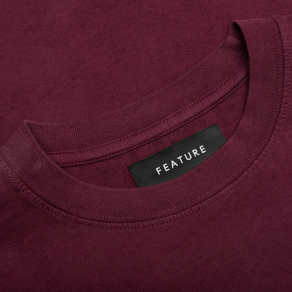 Wynn Logo Lock Up Tee - Oxblood Red – Feature