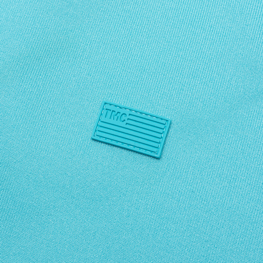 Puma x TMC Hustle Way Top - Maui Blue – Feature