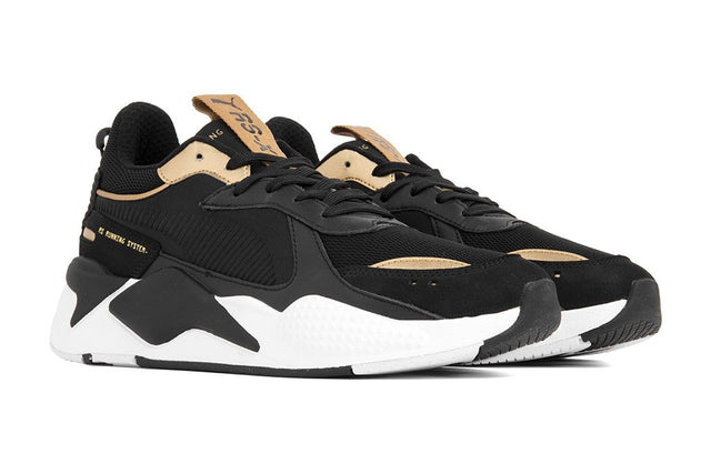 RS-X Trophy - Black/Team Gold – Feature